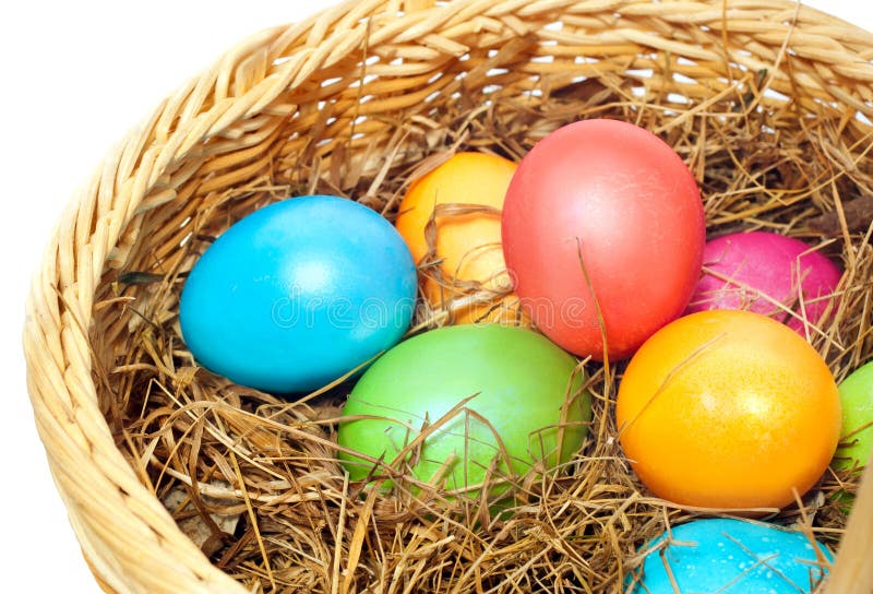 Easter Eggs in Wicker Basket Stock Image - Image of colored, colors ...