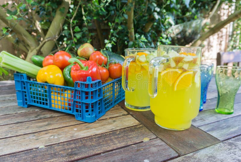 Basket of Fruit with Jug of Orange Squash. Stock Photo - Image of ...