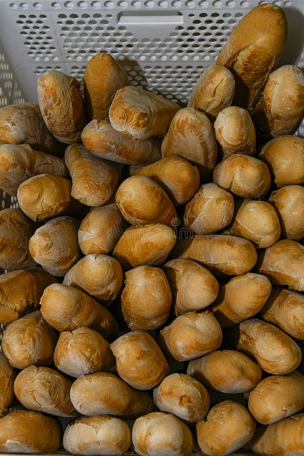 Basket Full of Loaves of Bread Inside the Bakery. Stock Photo - Image ...