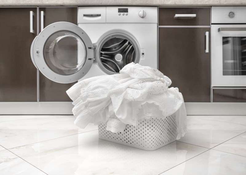 Basket with Laundry Near the Washing Machine. Stock Image - Image of ...
