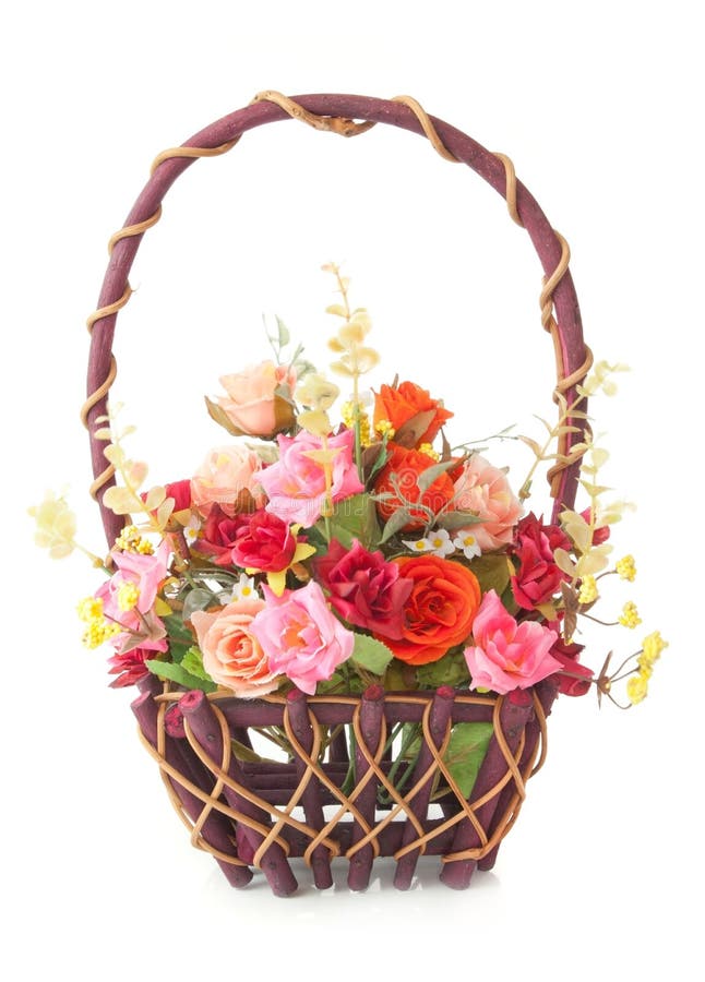 Beautiful Large Roses with Leaves in a Wicker Basket on the Table ...