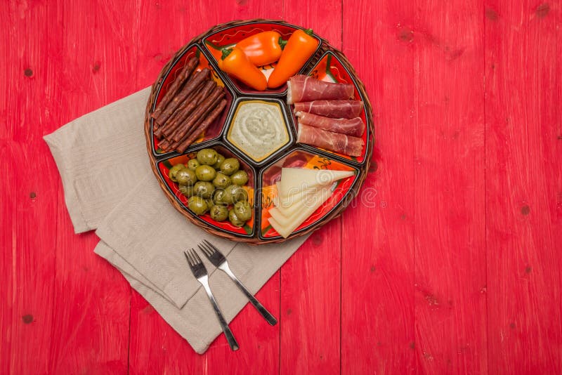 Basket with Several Spanish Tapas on Red Table Stock Image - Image of ...