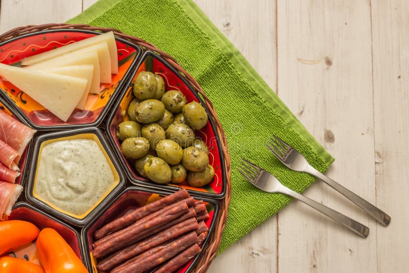 Basket with Several Spanish Tapas on White Table Stock Photo - Image of ...