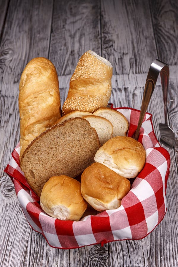Basket of assorted breads. stock image. Image of grocery - 124199469