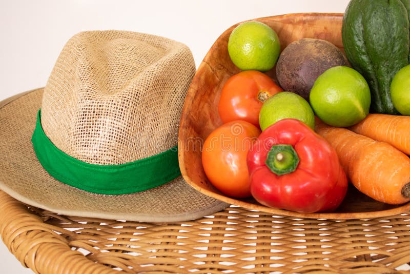 Basket of Vegetables and Straw Hat on the Table Stock Photo - Image of ...