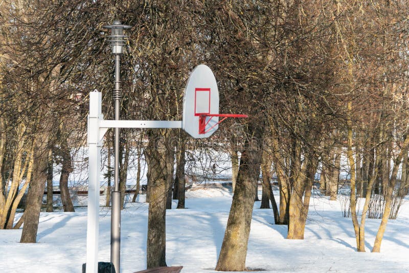 Basketball Backboard with a Ring in the Park in Winter on a Background ...
