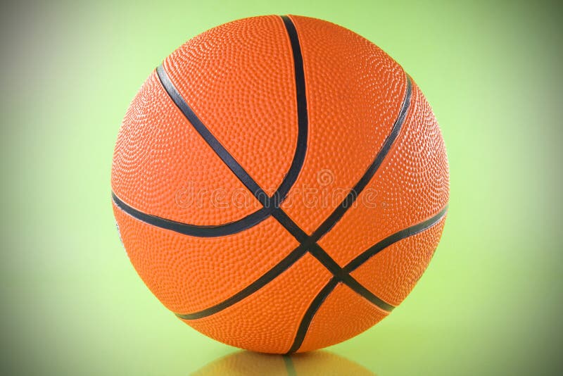 Basketball Ball Over a Green Background. Stock Image - Image of sport ...