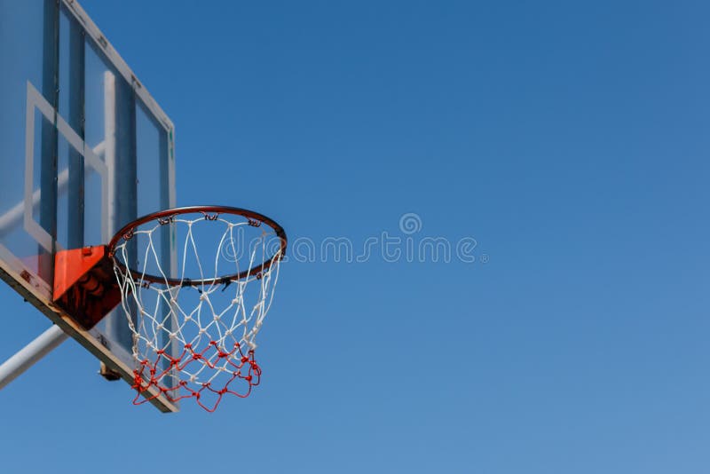 Basketball Board and Hoop with Blue Sky Background. Stock Image - Image ...