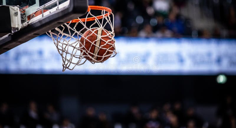 Basketball Game Ball in Hoop Stock Image - Image of team, hoop: 265321375