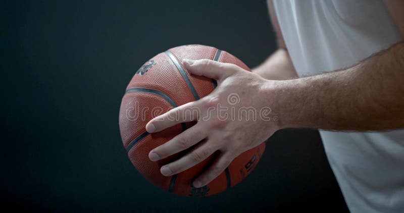 A Basketball in the Hands of a Man Stock Photo - Image of hands, male ...