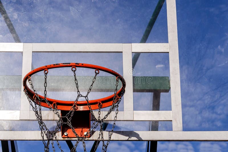Basketball Hoop on a Background of Blue Sky with Clouds. Sunny Stock ...