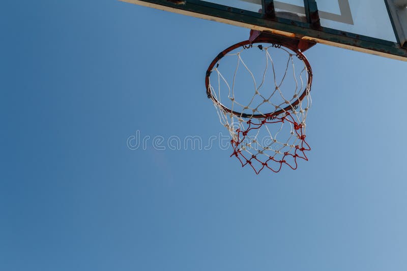 Basketball Board and Hoop with Blue Sky Background. Stock Image - Image ...