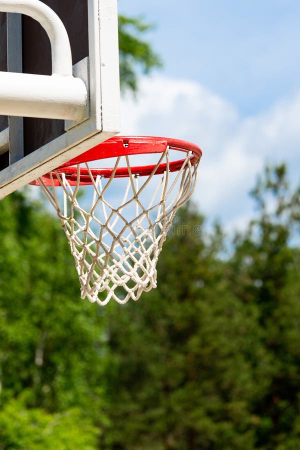 Basketball Hoop in the Park with Green Trees As Background Stock Image ...