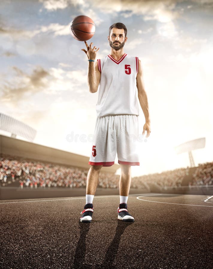 Professional Basketball Player in an Action in Basketball Field. Stock ...