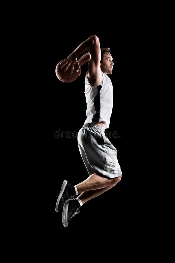 Basketball Player in Action is Flying High Stock Image - Image of black ...