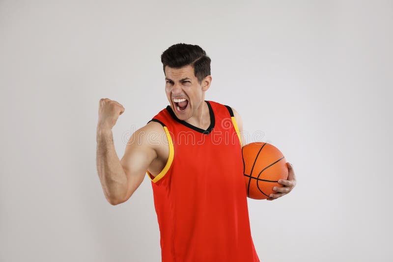 Basketball Player with Ball on Grey Background Stock Photo - Image of ...