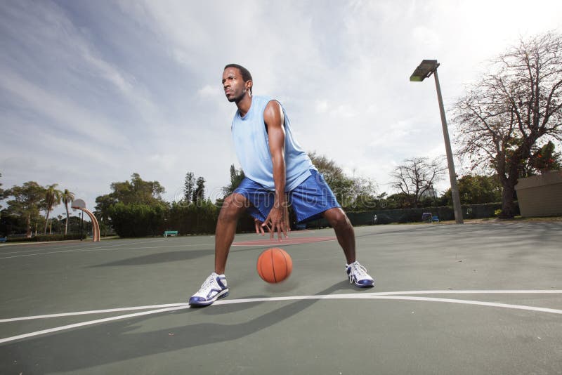 Basketball Player Dribbling the Ball Stock Photo - Image of court ...