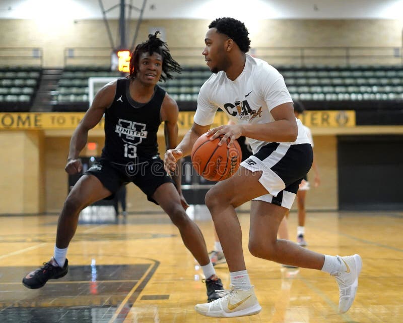 Basketball Player Dribbling the Ball into the Hoop Editorial Photo ...