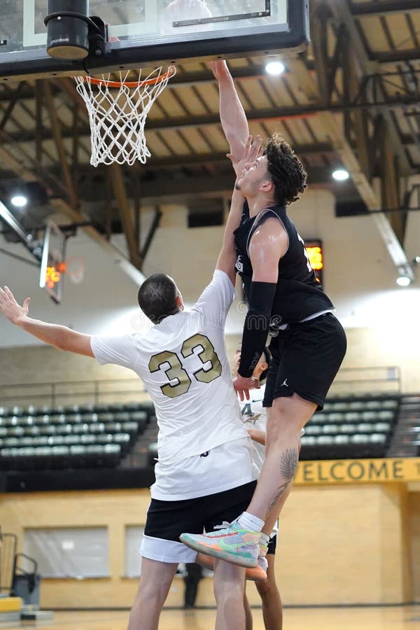 Basketball Player Dunking the Ball into the Hoop Editorial Stock Image ...