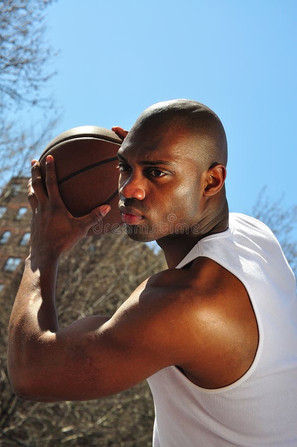 Basketball Player Guarding Ball Stock Photo - Image of tired, sunny ...