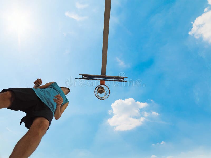 Basketball Player by the Hoop Seen from Below Stock Photo - Image of ...