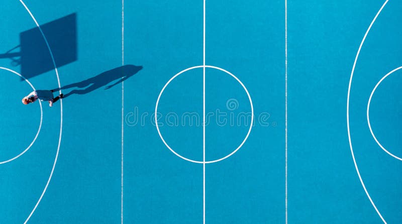 Basketball Player, Long Shadows on Basketball Court, Creative Visual ...