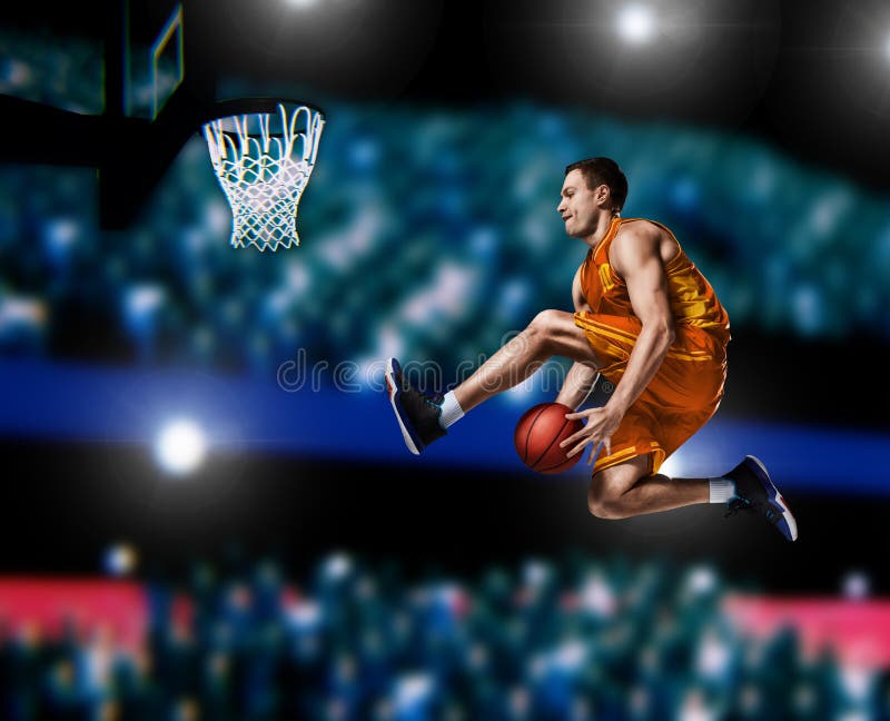 Basketball Player Making Slam Dunk on Basketball Arena Stock Photo ...