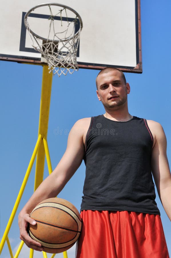 Basketball player posing stock image. Image of player - 25676947