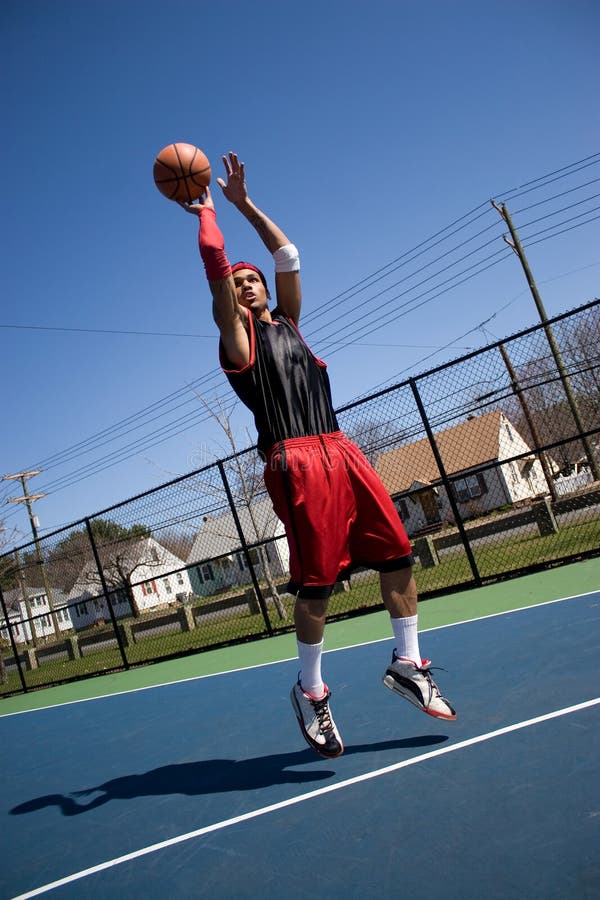 Basketball Player Shooting stock image. Image of player - 9253249