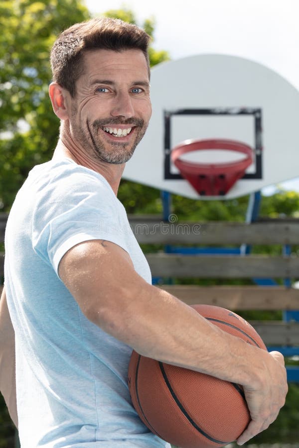 Basketball Player Smiling at Camera Stock Photo - Image of lifestyle ...