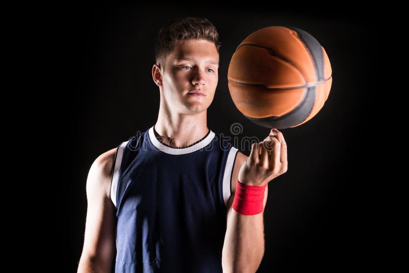 Basketball Player Spinning Ball on Finger Stock Photo - Image of ...