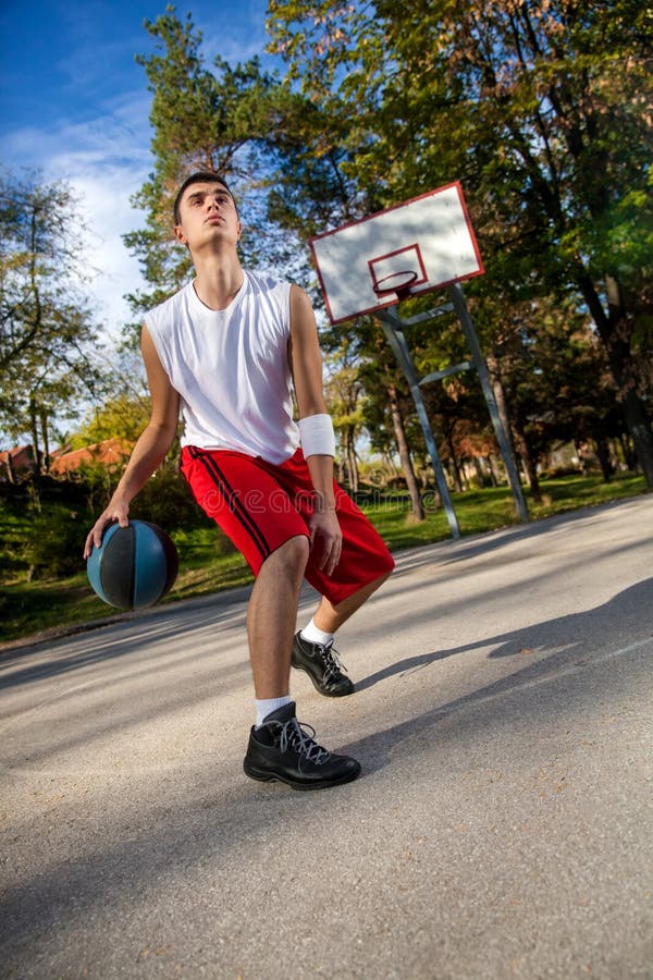 Basketball Player stock photo. Image of athletic, fall - 34618732