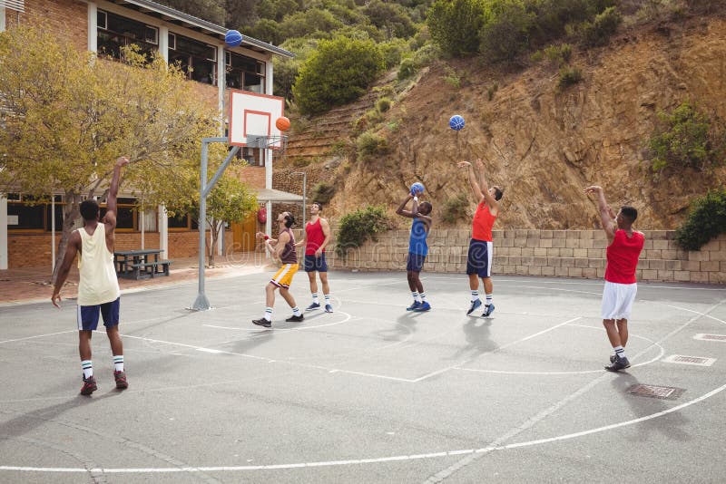 Basketball Players Practicing in Basketball Court Stock Image - Image ...