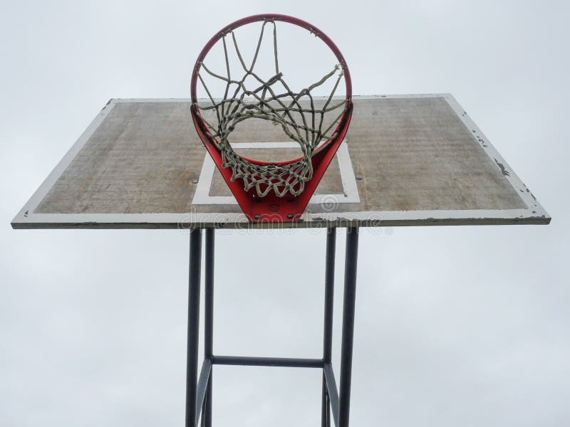 Basketball Red Hoop and Net on a Wooden Old Worn Board Stock Photo ...