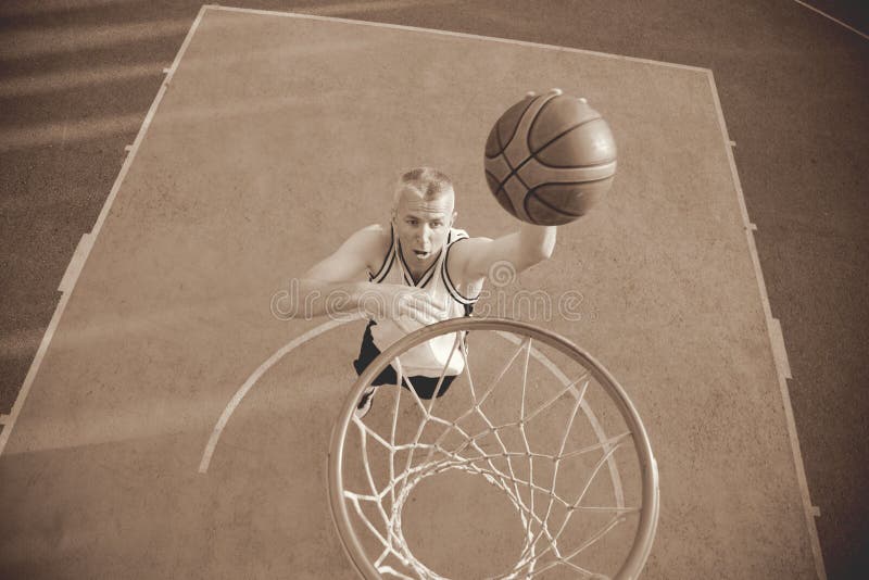 Basketball Street Player Making a Slam Dunk Stock Photo - Image of ...