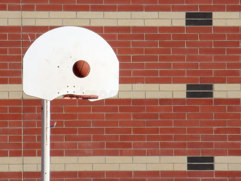 A Basketball Suspended in Time, Just before Its Trajectory Toward the ...