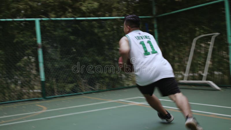 Basketball Team Practice at Sunrise. Friendly Match on the Basketball ...