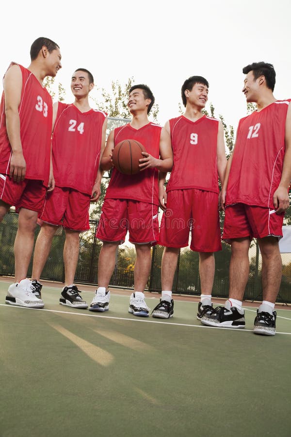 Basketball Team Standing and Smiling, Portrait Stock Image - Image of ...
