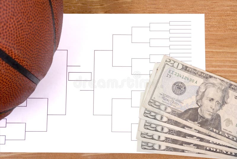 March Madness Basketball Bracket and Fanned Money Stock Image - Image ...