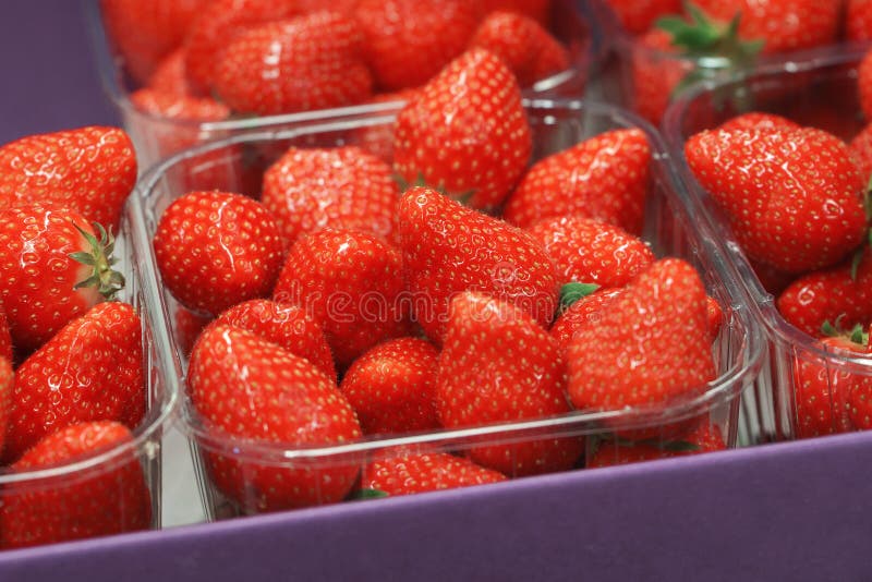 Baskets of Fresh Delicious Strawberries in Store, Closeup. Stock Photo ...