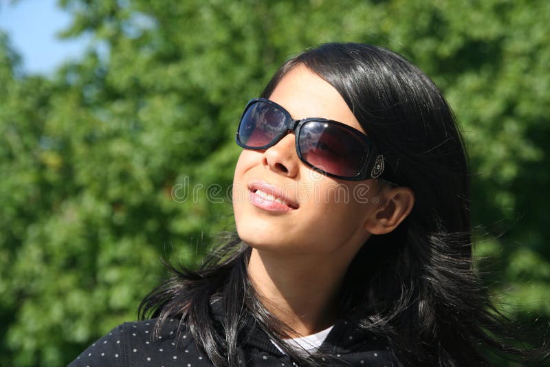 Basking in the Sun stock photo. Image of race, ethnic - 5654146