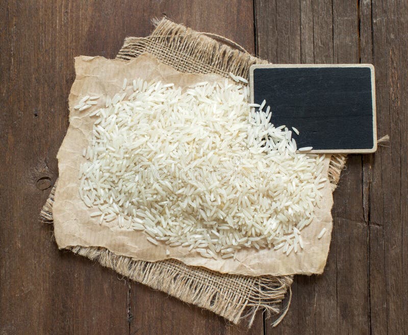 Basmati Raw Rice on Wood with a Small Chalkboard Stock Image - Image of ...