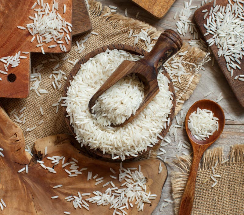Basmati Rice in a Bowl with a Spoon Stock Photo - Image of grain, bowl ...