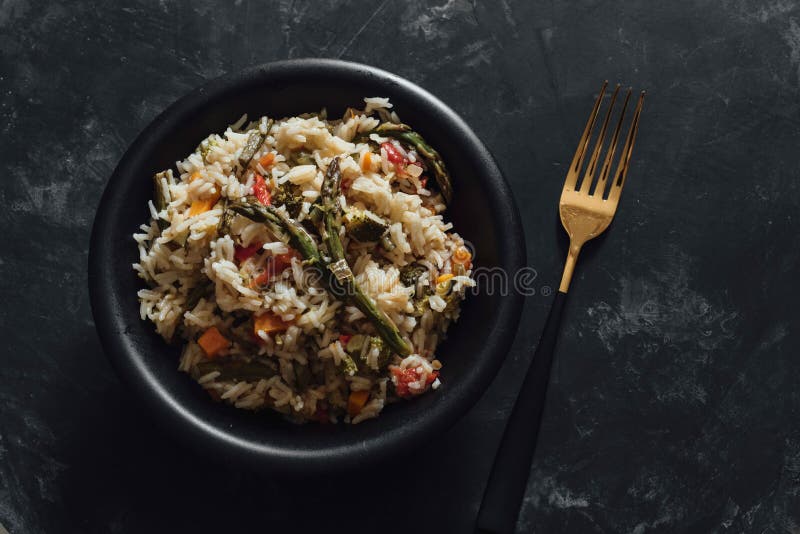 Basmati Rice with Sauteed Vegetables on Dark Table Stock Image - Image ...