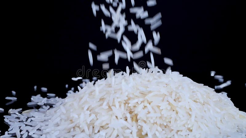 Basmati White Rice Falling on a Black Background Stock Video - Video of ...