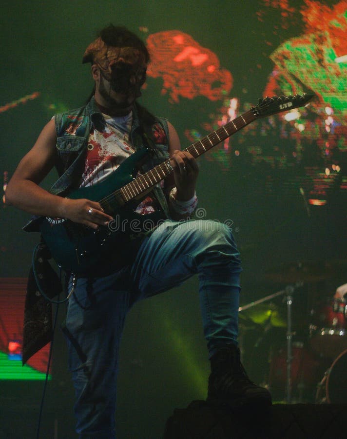 Bass Guitar Player With Mask Picture. Image: 99939795