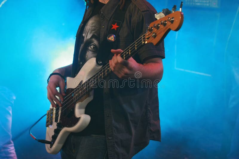 Bass guitar player editorial photo. Image of action, performance - 65357576