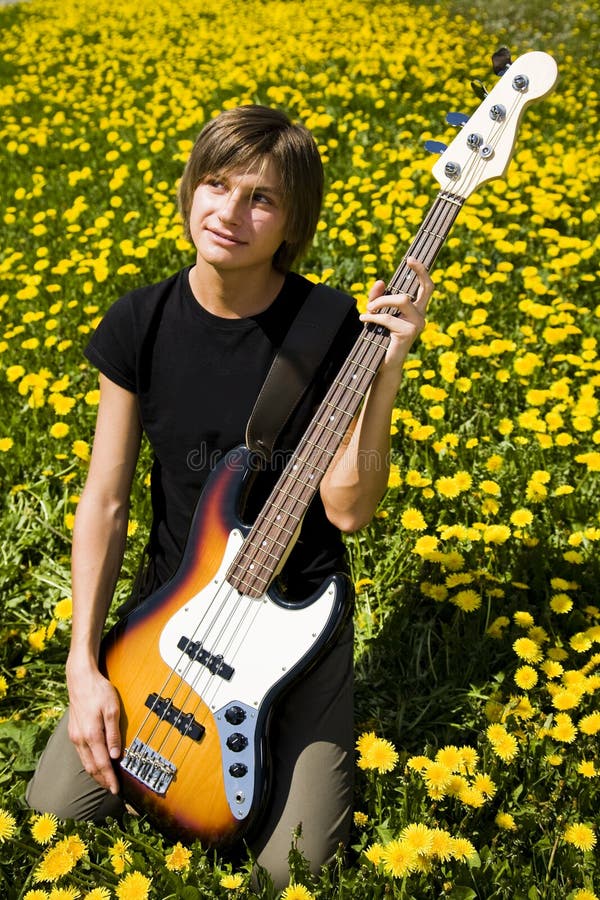 Bass player stock photo. Image of flower, male, playing - 13519720
