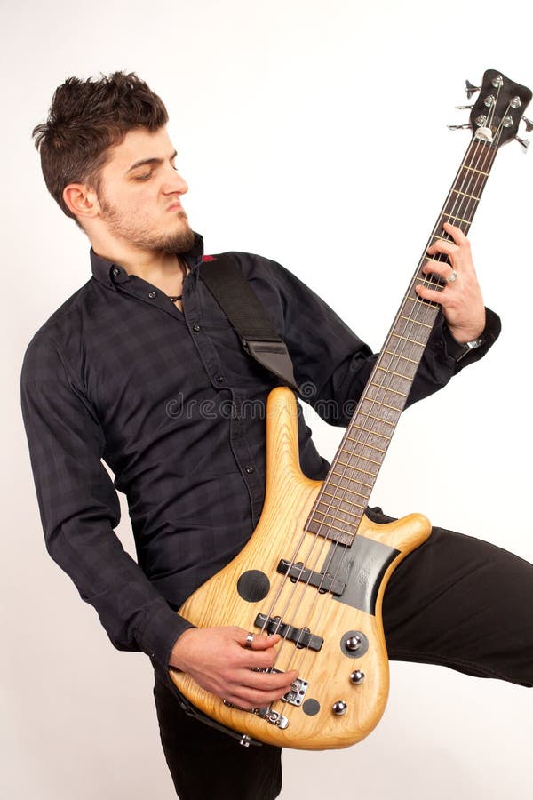 Focused Bass Player in Black Stock Image - Image of instrument, audio ...