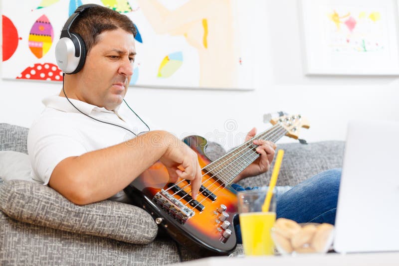 Heavy Metal Bass Guitar Player Stock Image - Image of guitar, sound ...